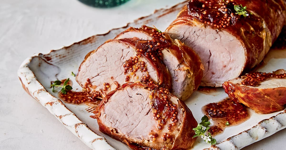 Filet de porc enveloppé de prosciutto, sauce aux figues et à la ...